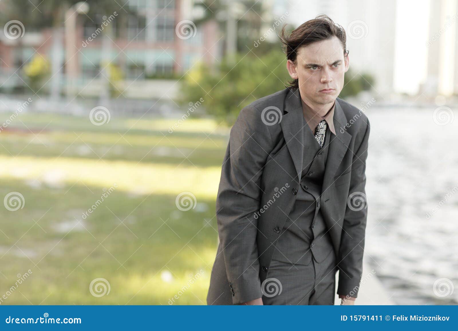 Young Businessman Slouching Stock Image - Image of person, trendy: 15791411