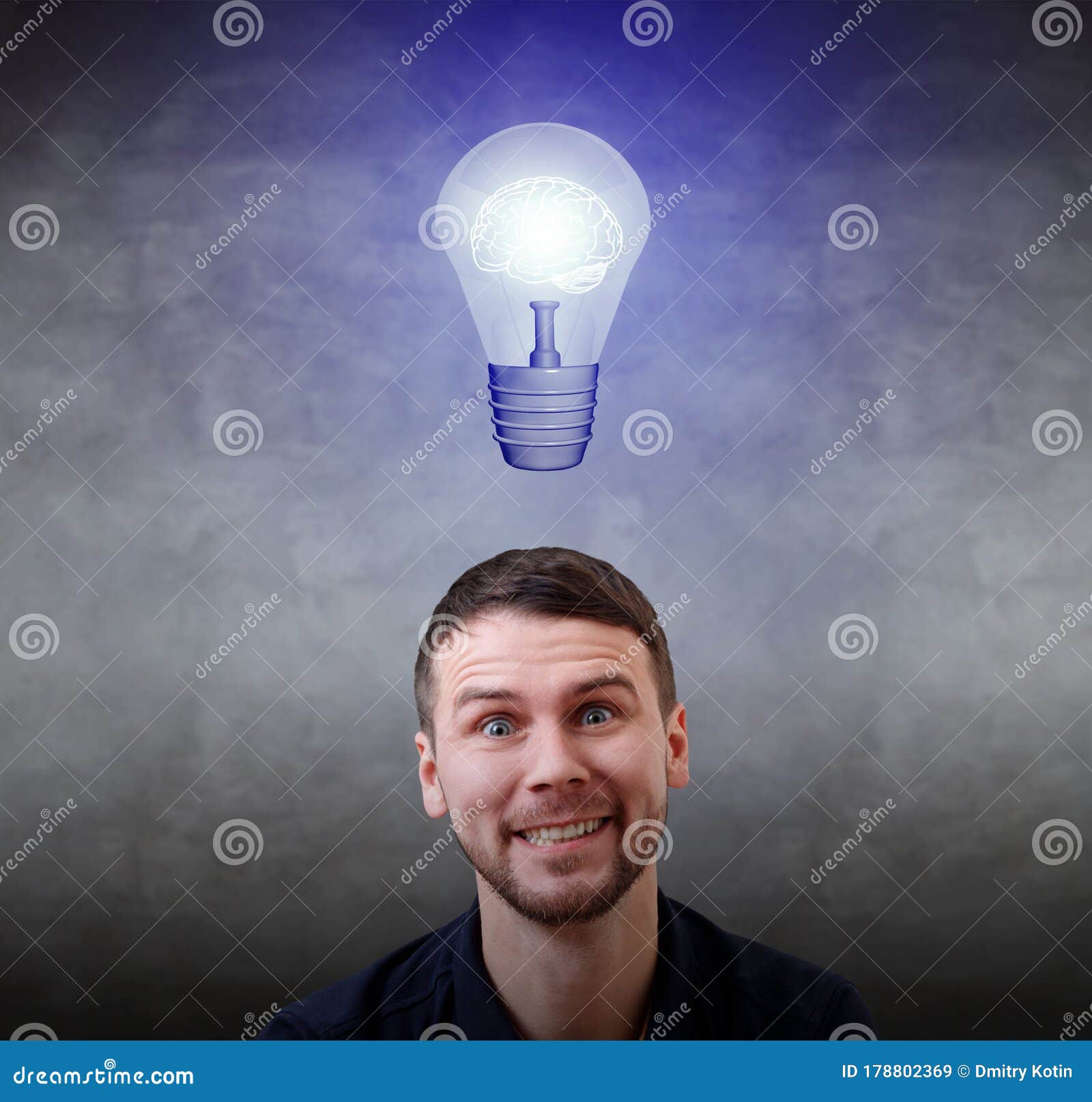 Young Businessman Smiling with Light Bulb Over Head. Stock Image ...