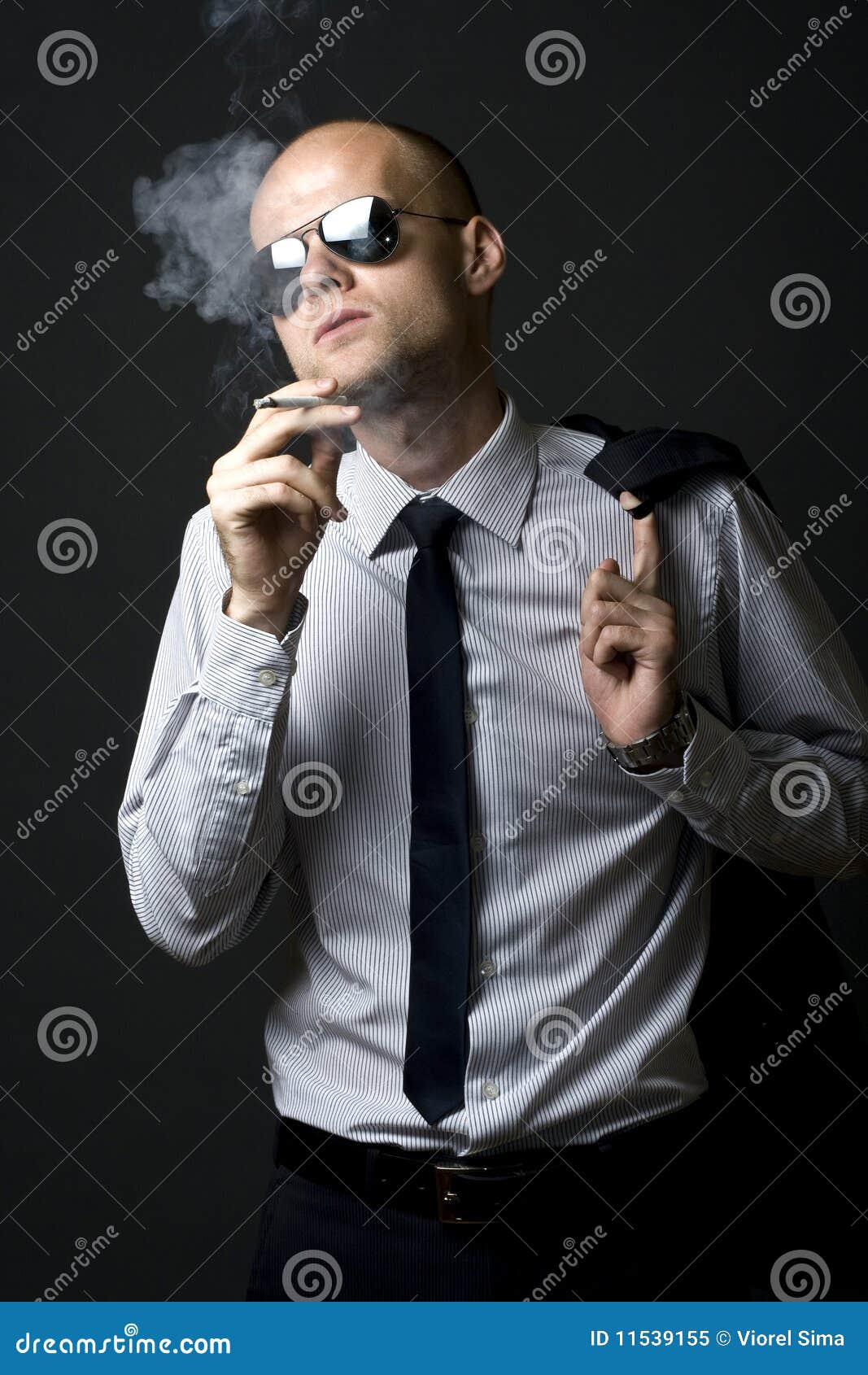 Young businessman smoking stock image. Image of concept - 11539155
