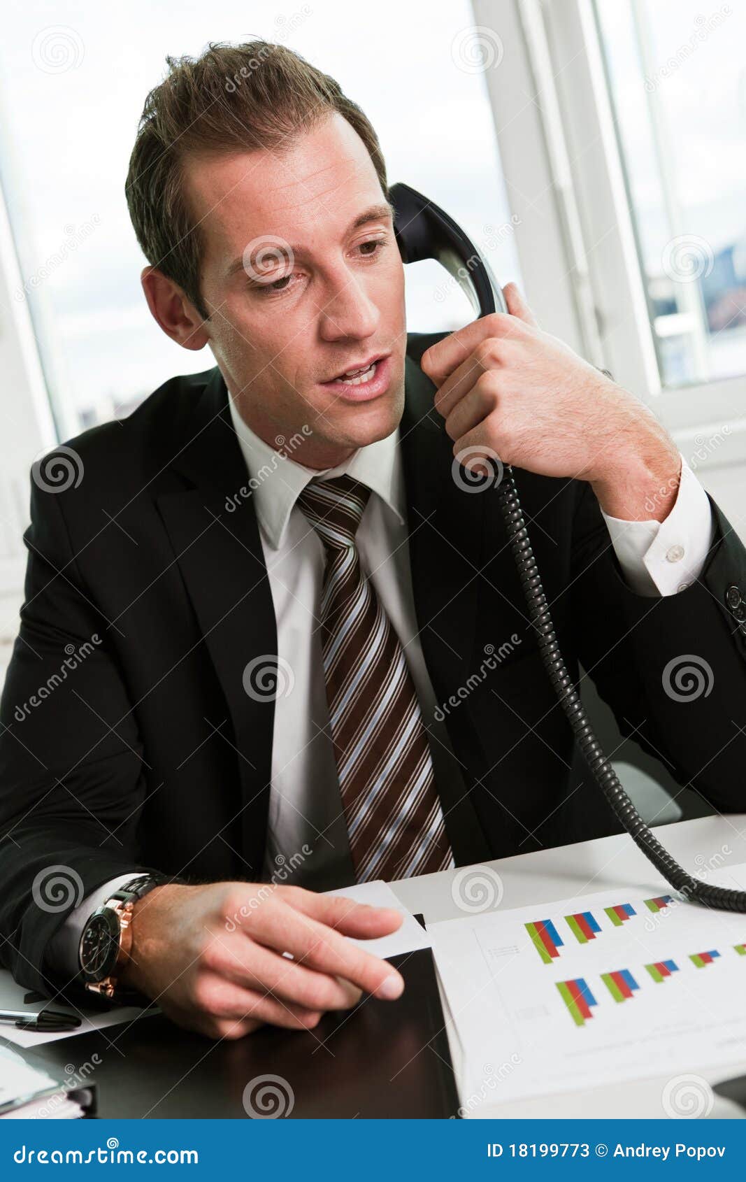 Young Businessman Speaking on the Phone Stock Image - Image of landline ...