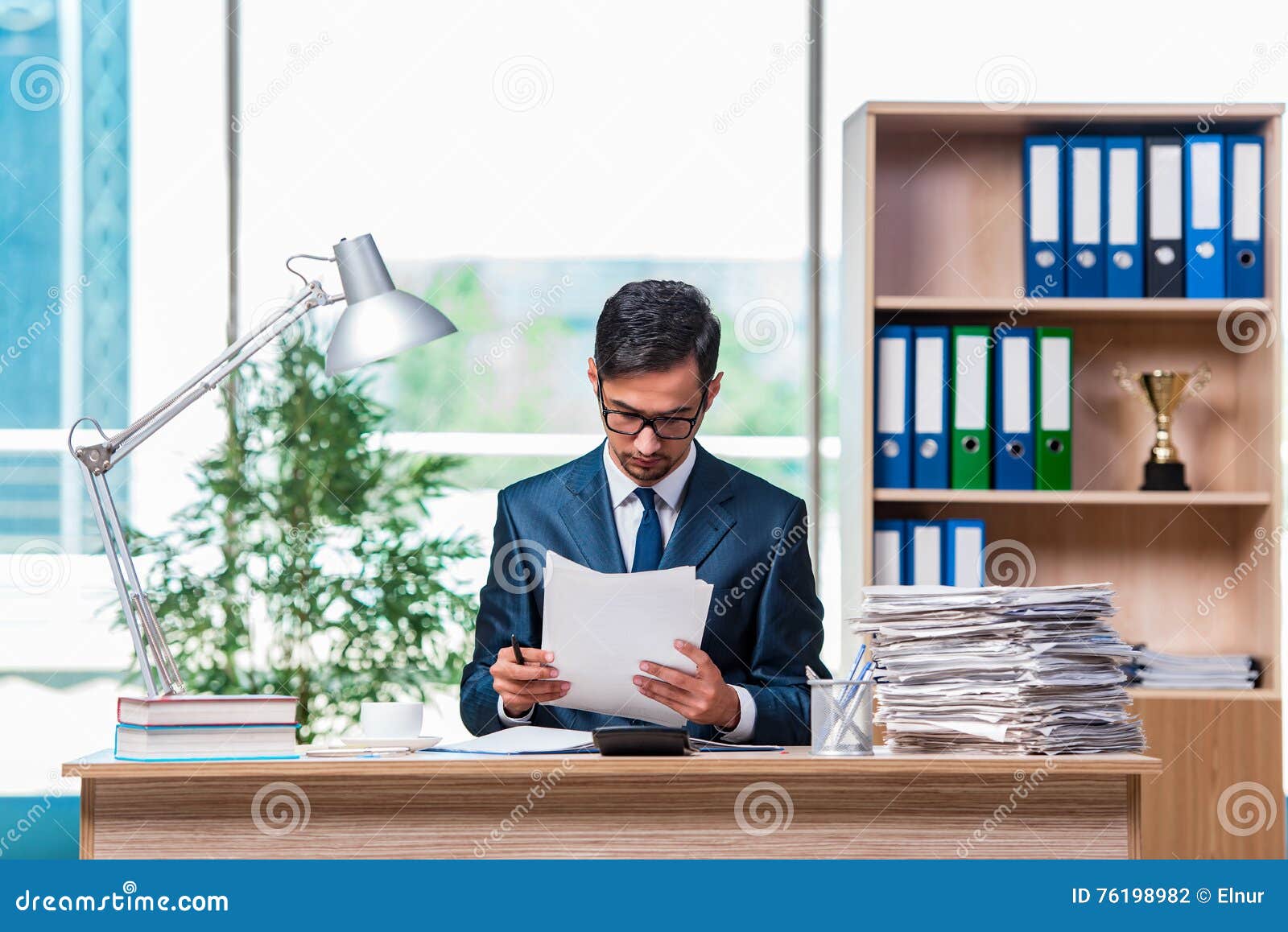The Young Businessman in Stress with Lots of Paperwork Stock Photo ...
