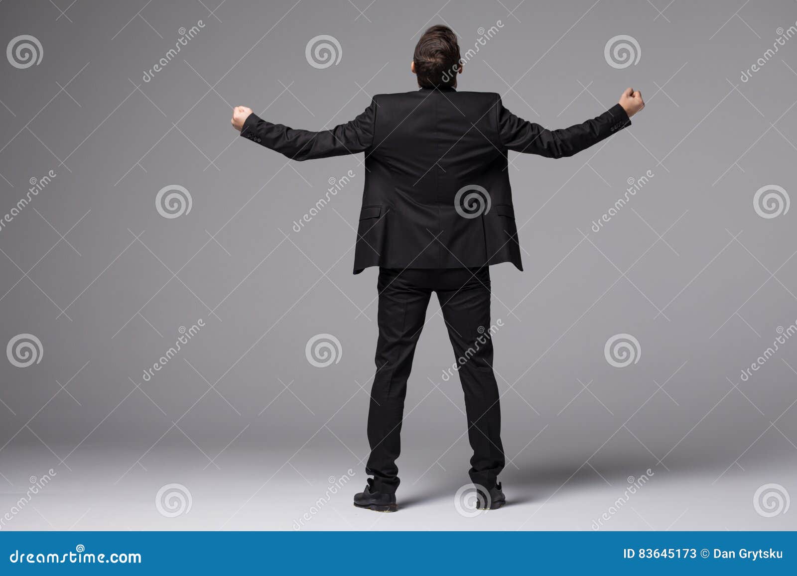Young Businessman in Suit Raised Hands Back Side Stock Image - Image of ...