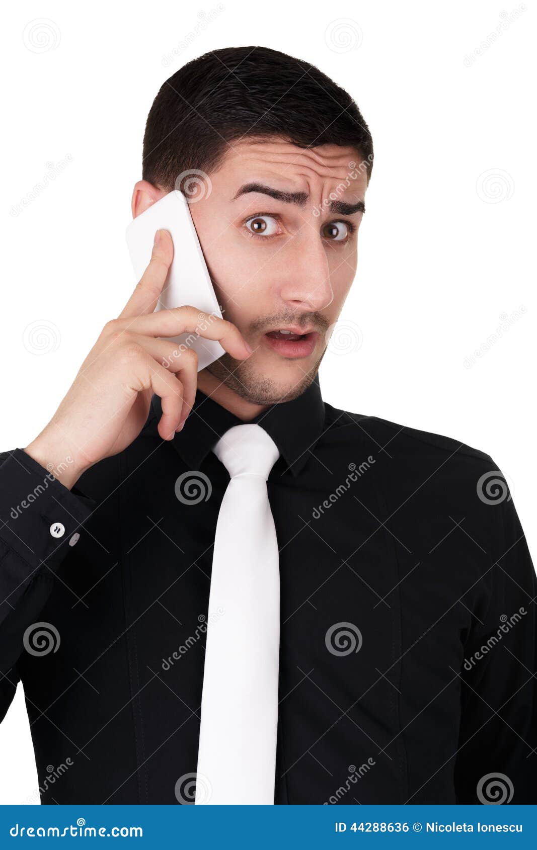 Young Businessman with Surprised Expression on the Phone Stock Photo ...