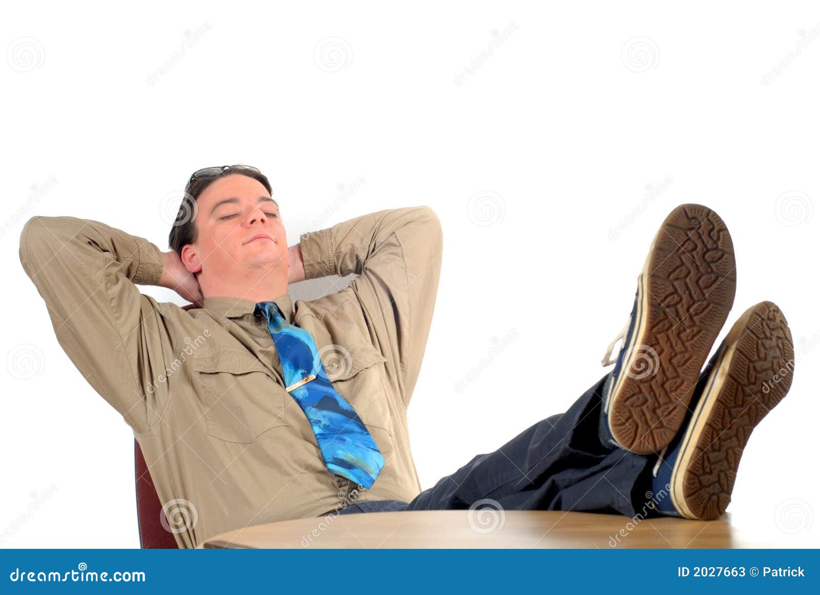 Young Businessman Taking a Break Stock Image - Image of daydream, break ... Young Businessman Taking a Break Stock Image - Image of daydream, break ...