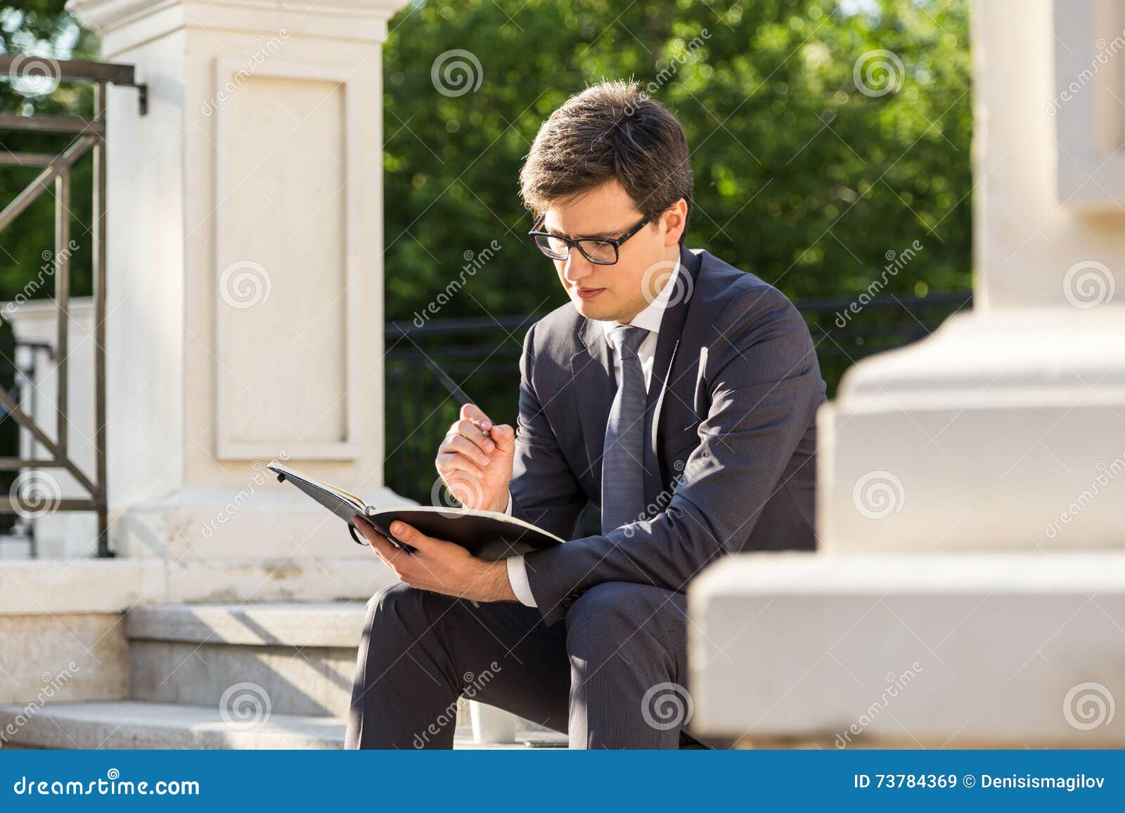 Young Businessman Taking Notes Stock Image - Image of document ...