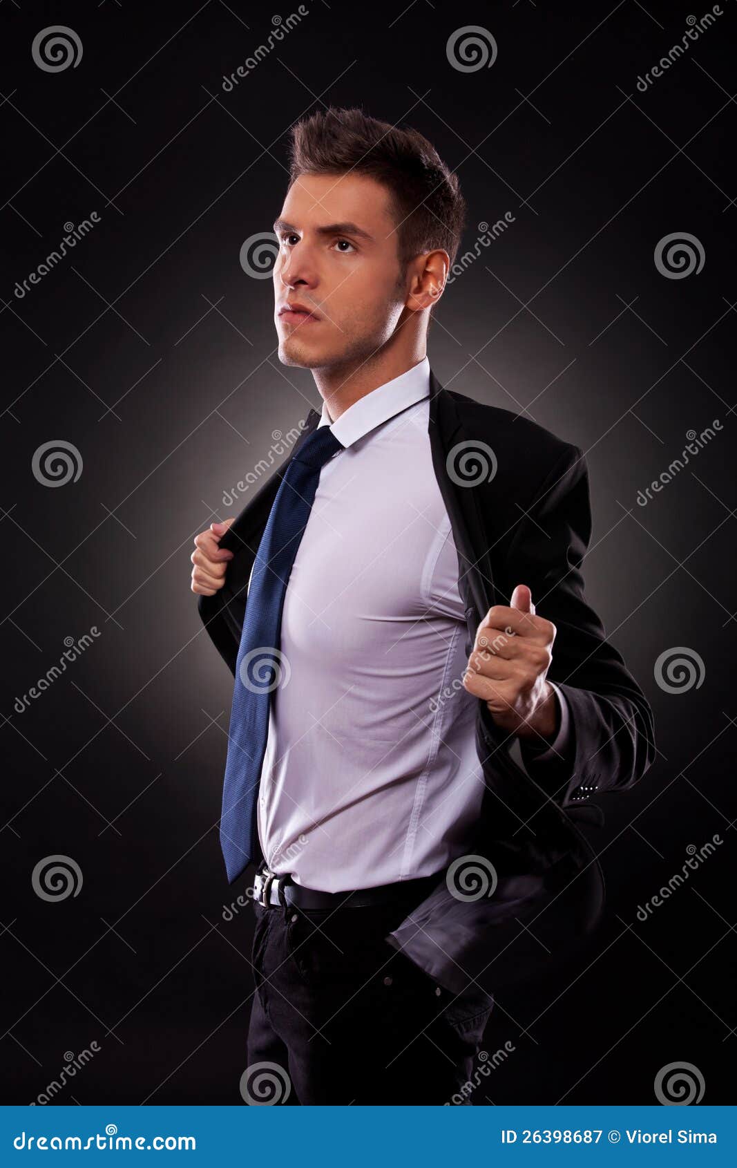 A Young Businessman Taking Off His Jacket Stock Image - Image of leader ...