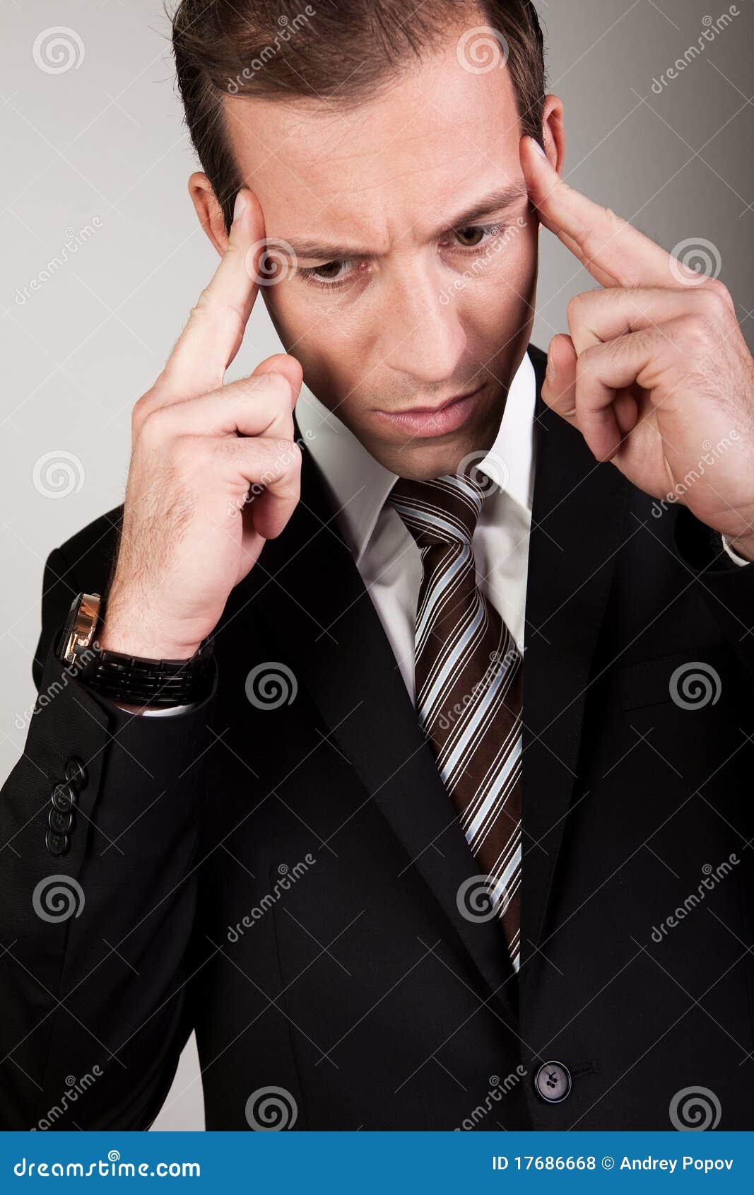 Young Businessman is Thinking Hard Stock Photo - Image of looking ...