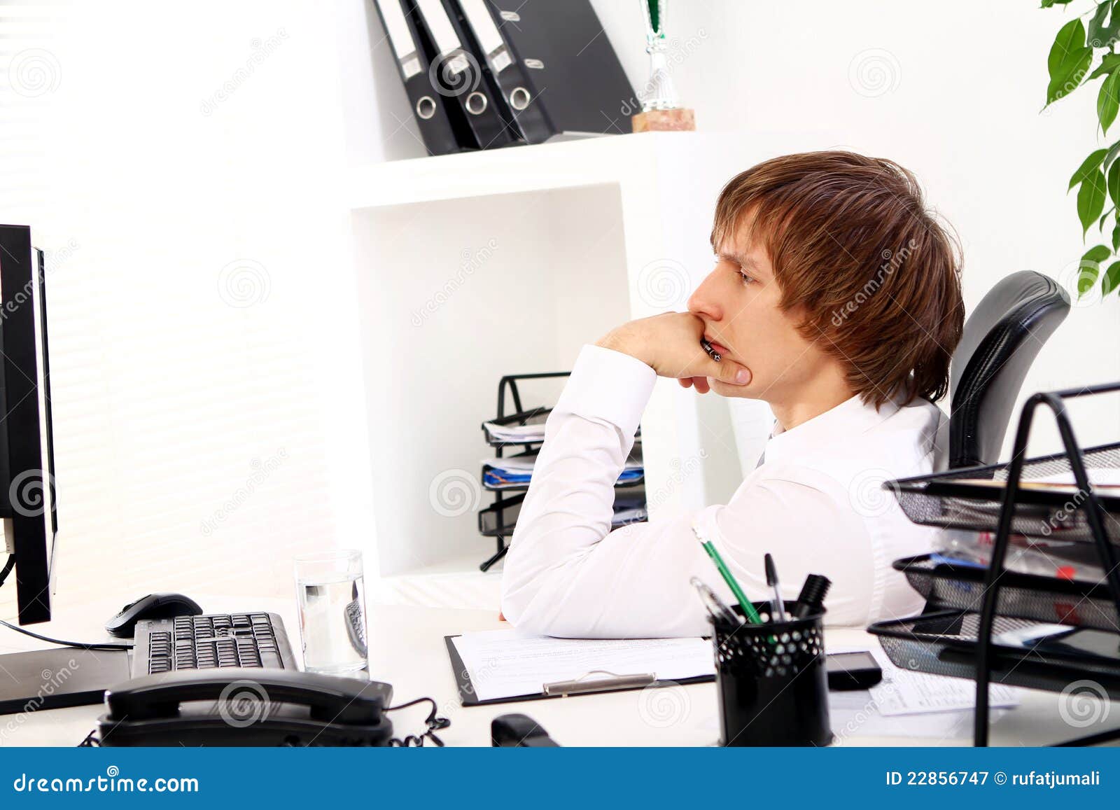 Young Businessman Thinking in Office Stock Image - Image of face ...