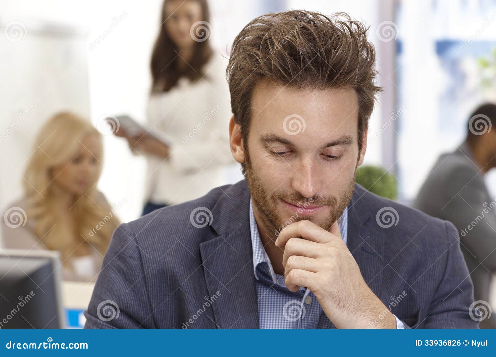 Young Businessman Thinking in Office Stock Photo - Image of bristly ...