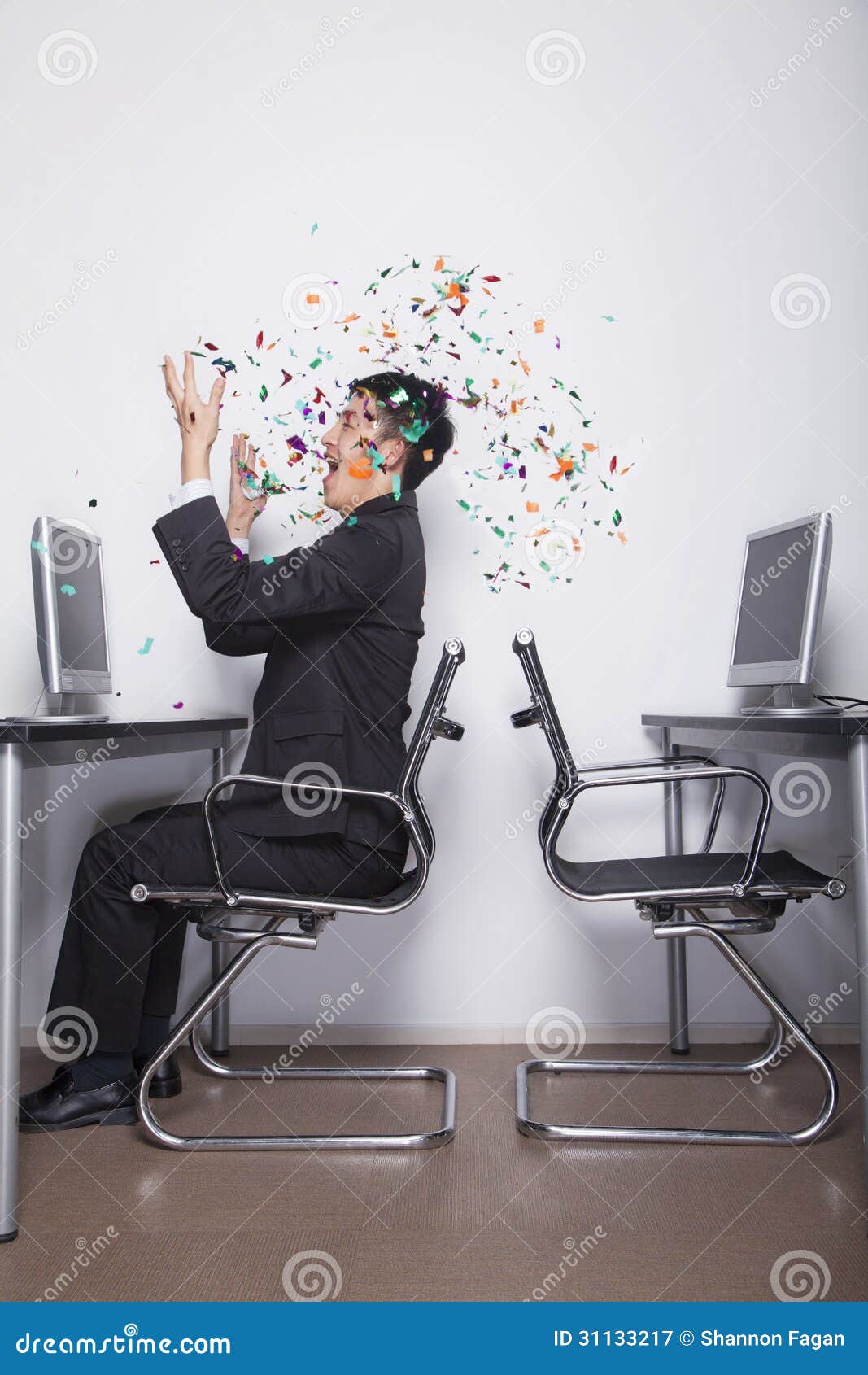 Young Businessman Throwing Confetti in the Office Stock Image - Image ...