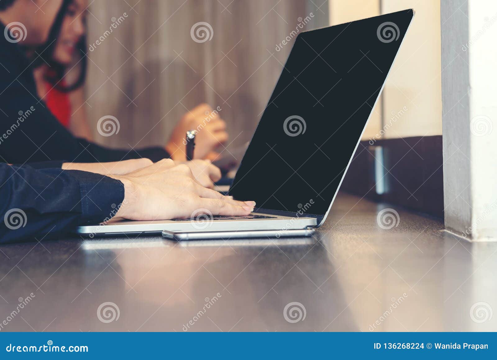 Young Businessman Training on the Computer, Sitting at the Desk with ...