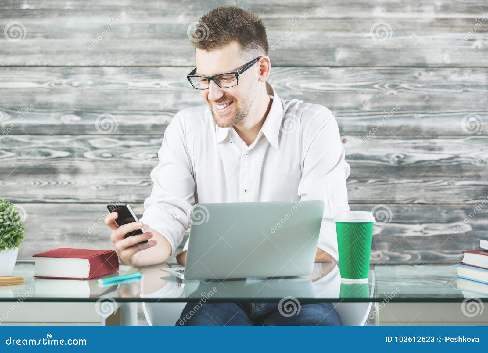 Young Businessman Using Device at Workplace Stock Image - Image of ...