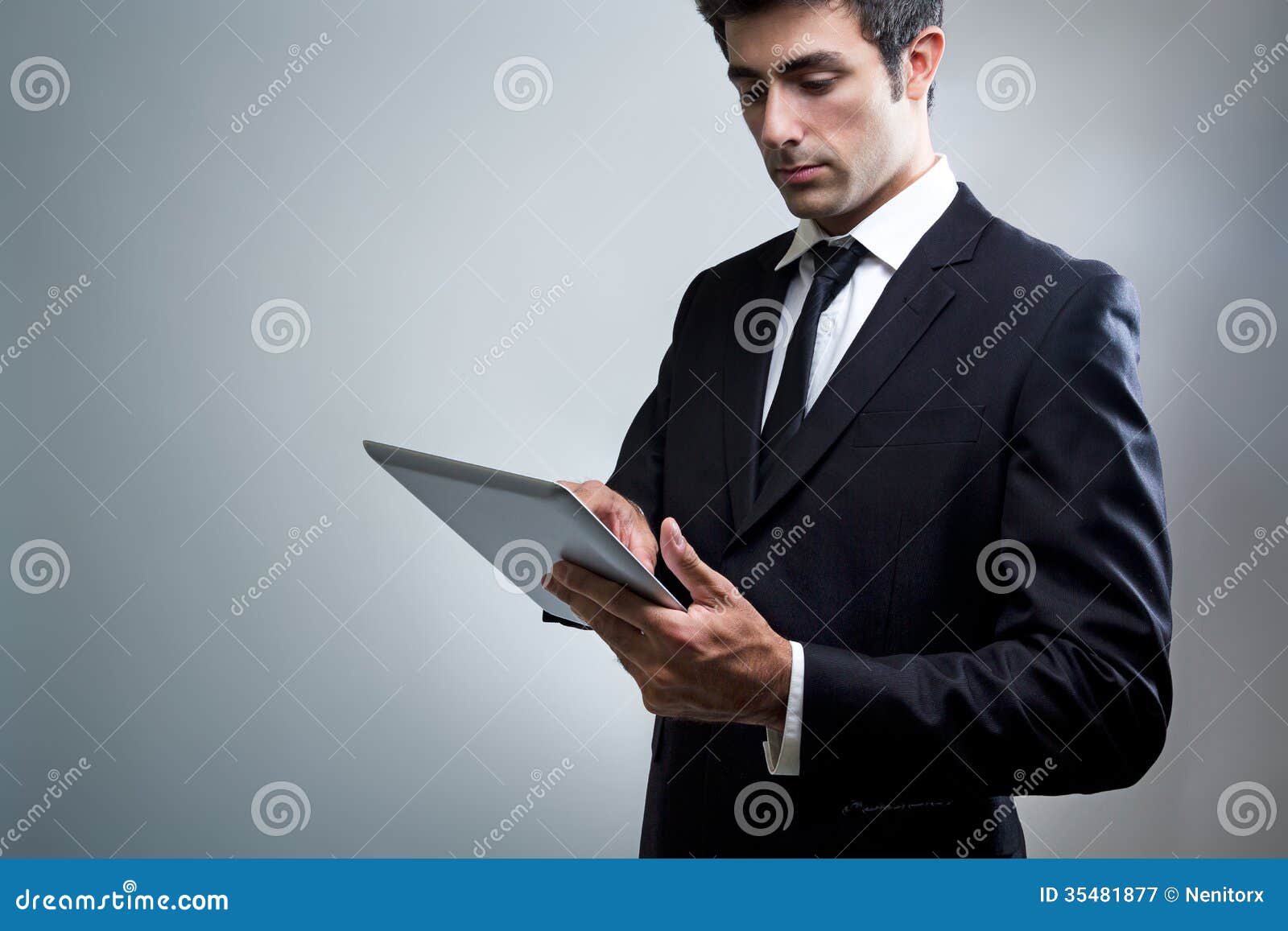 Young Businessman Using Digital Tablet Stock Image - Image of ...