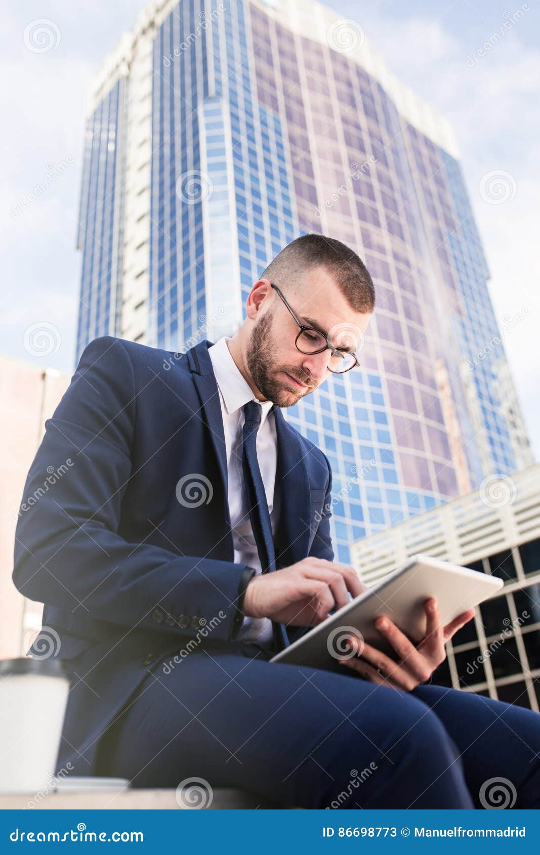 Young Businessman Using a Tablet Computer Stock Image - Image of ...