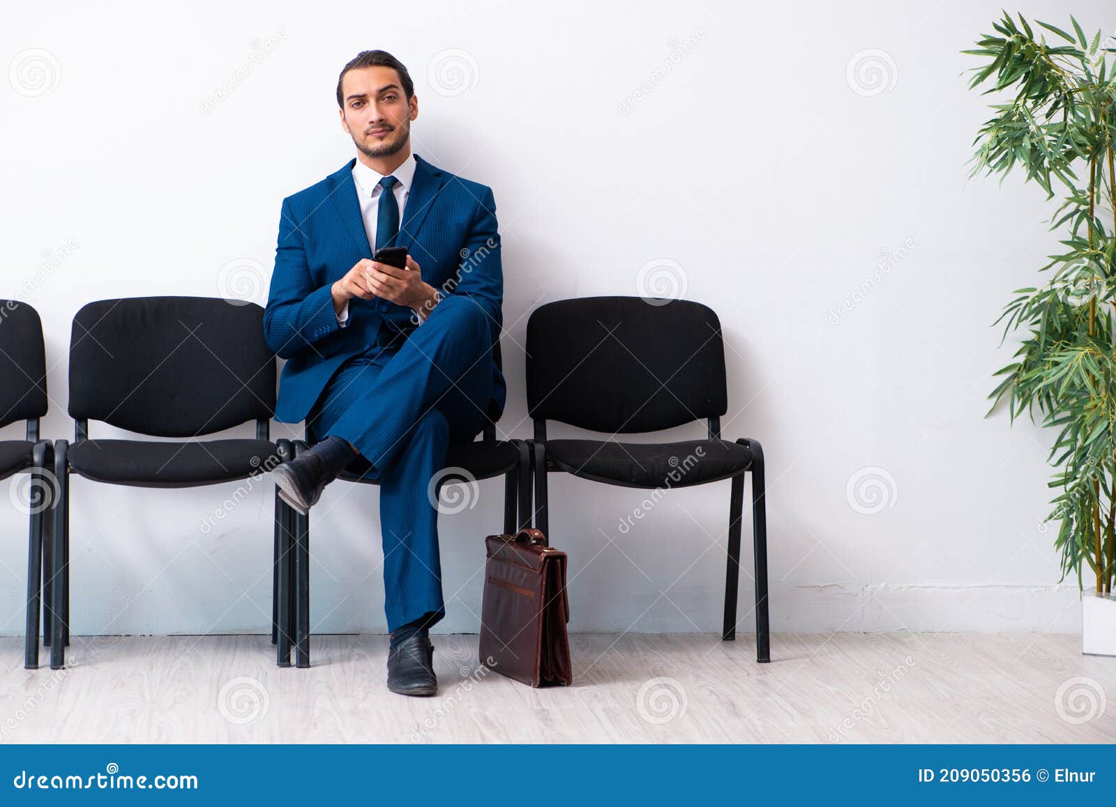 Young Businessman Waiting for an Interview at Hall Stock Photo - Image ...