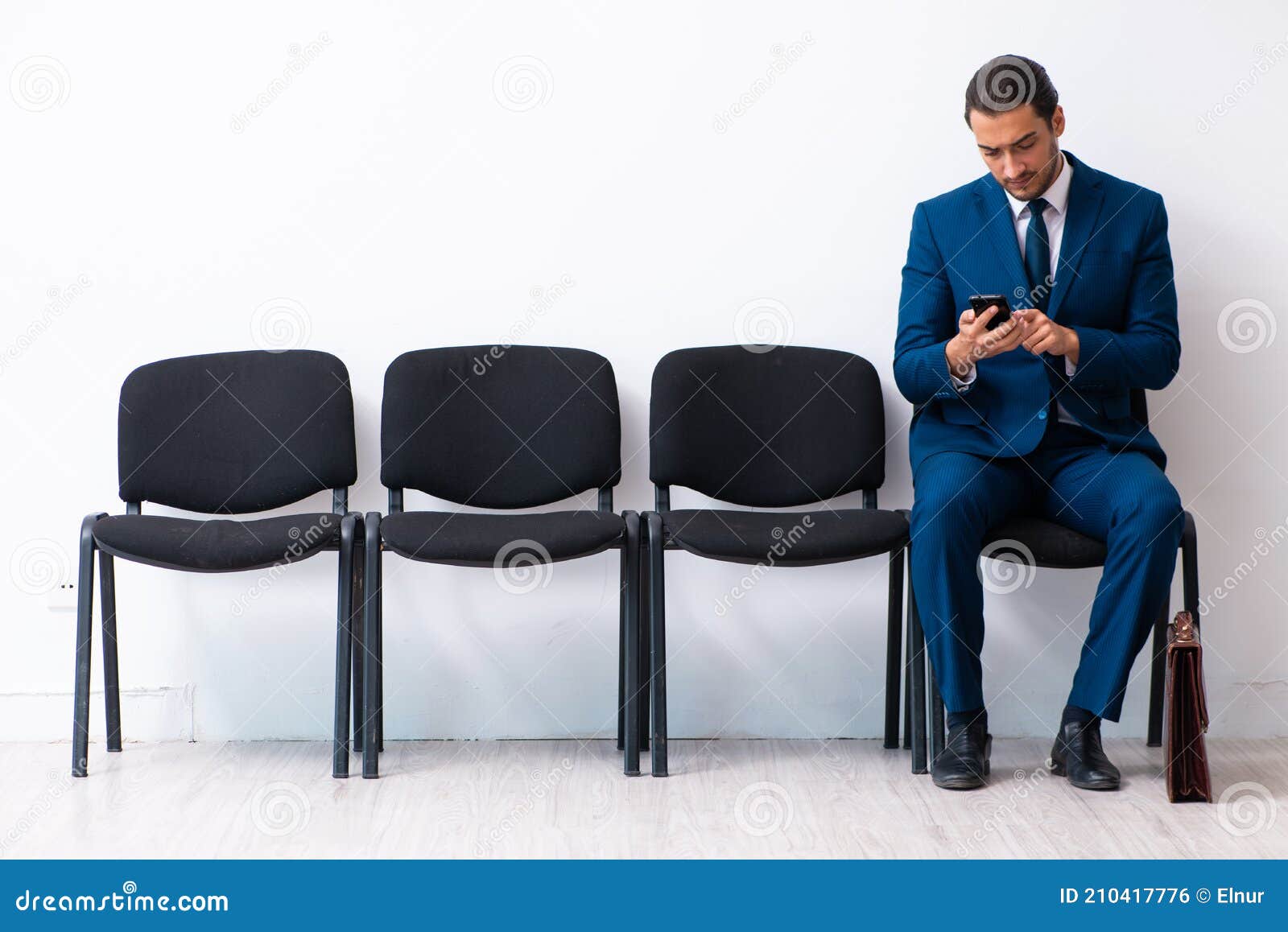 Young Businessman Waiting for an Interview at Hall Stock Photo - Image ...