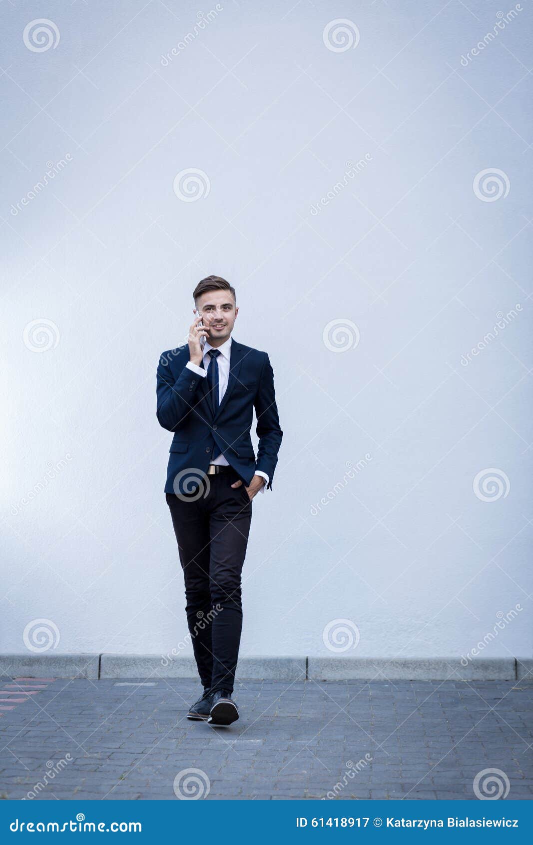 Young Businessman Walking and Talking Stock Image - Image of person ...