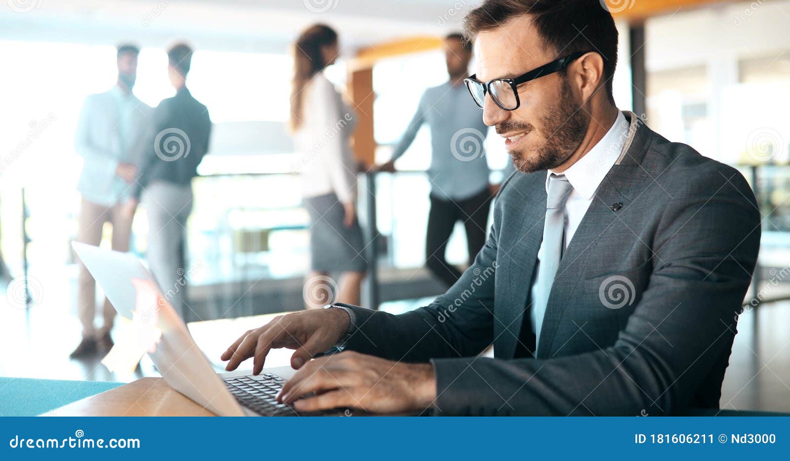 Young Businessman Working on Computer in Office Stock Image - Image of ...