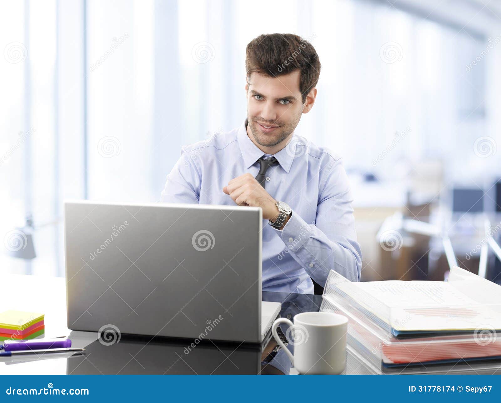 Young Businessman Working on Laptop Stock Photo - Image of hair ...