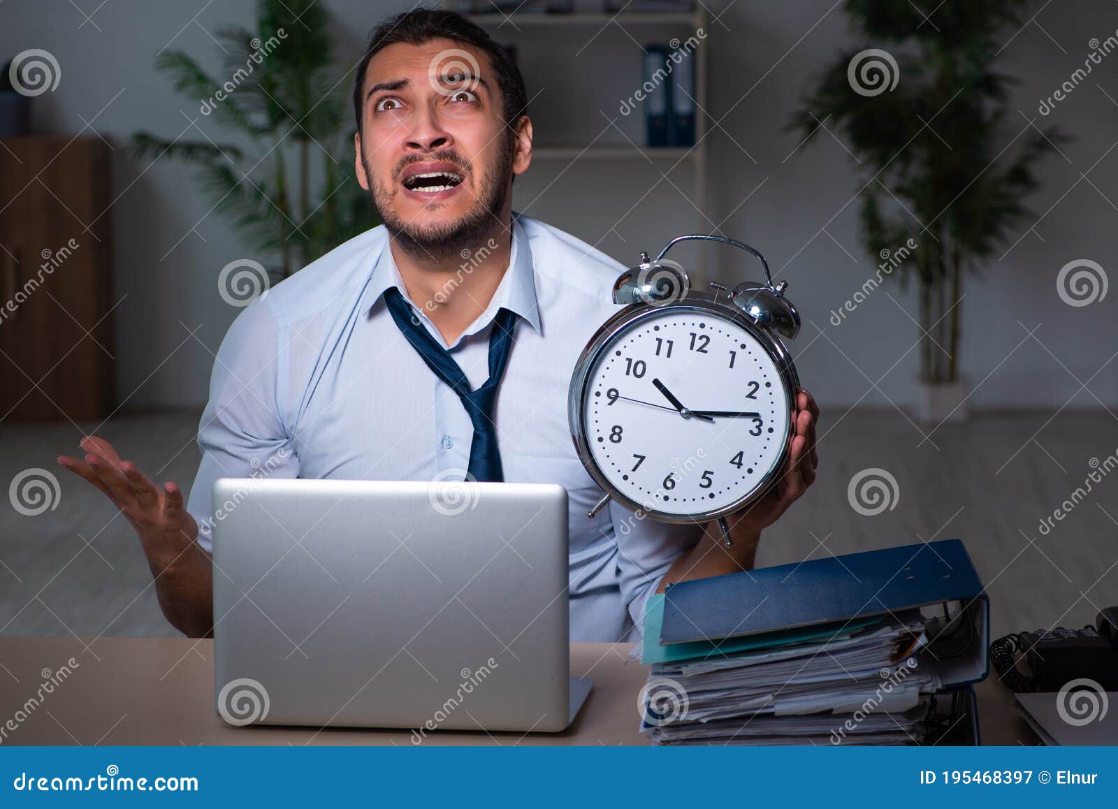 Young Businessman Working Late in the Office Stock Image - Image of ...