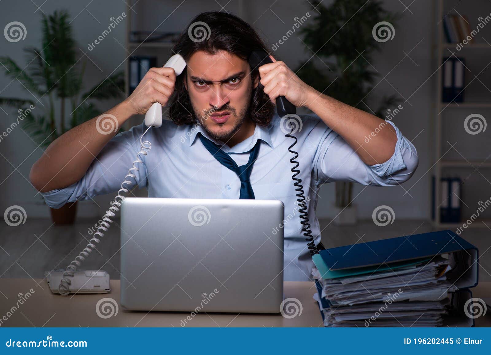 Young Businessman Working Late in the Office Stock Image - Image of ...