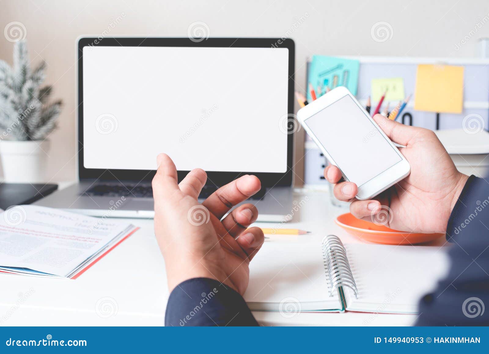 Young Businessman Working with Smartphone and Computer Laptop on ...