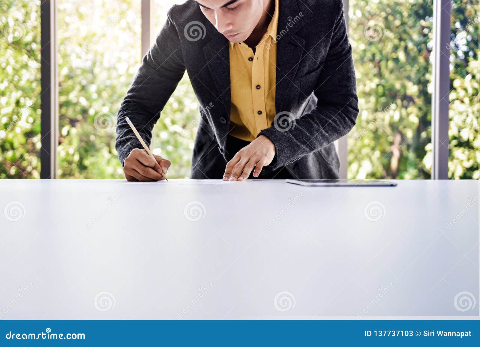 Young Businessman Working on the Table in Office Stock Image - Image of ...