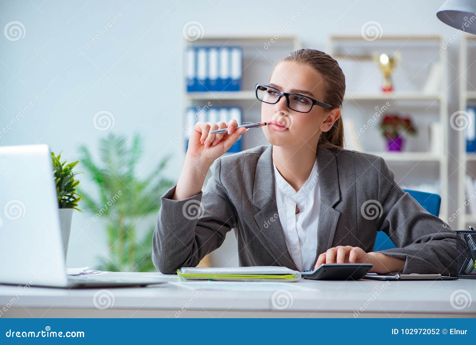 The Young Businesswoman Accountant Working in the Office Stock Photo ...
