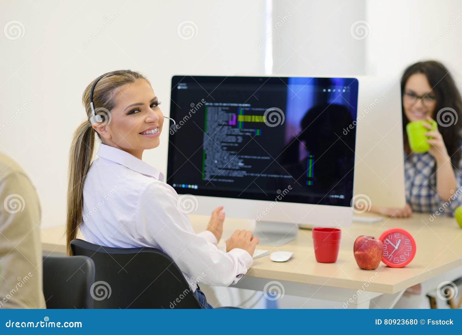 Young Businesswoman with Braces on a Coffee Break. Using Computer ...