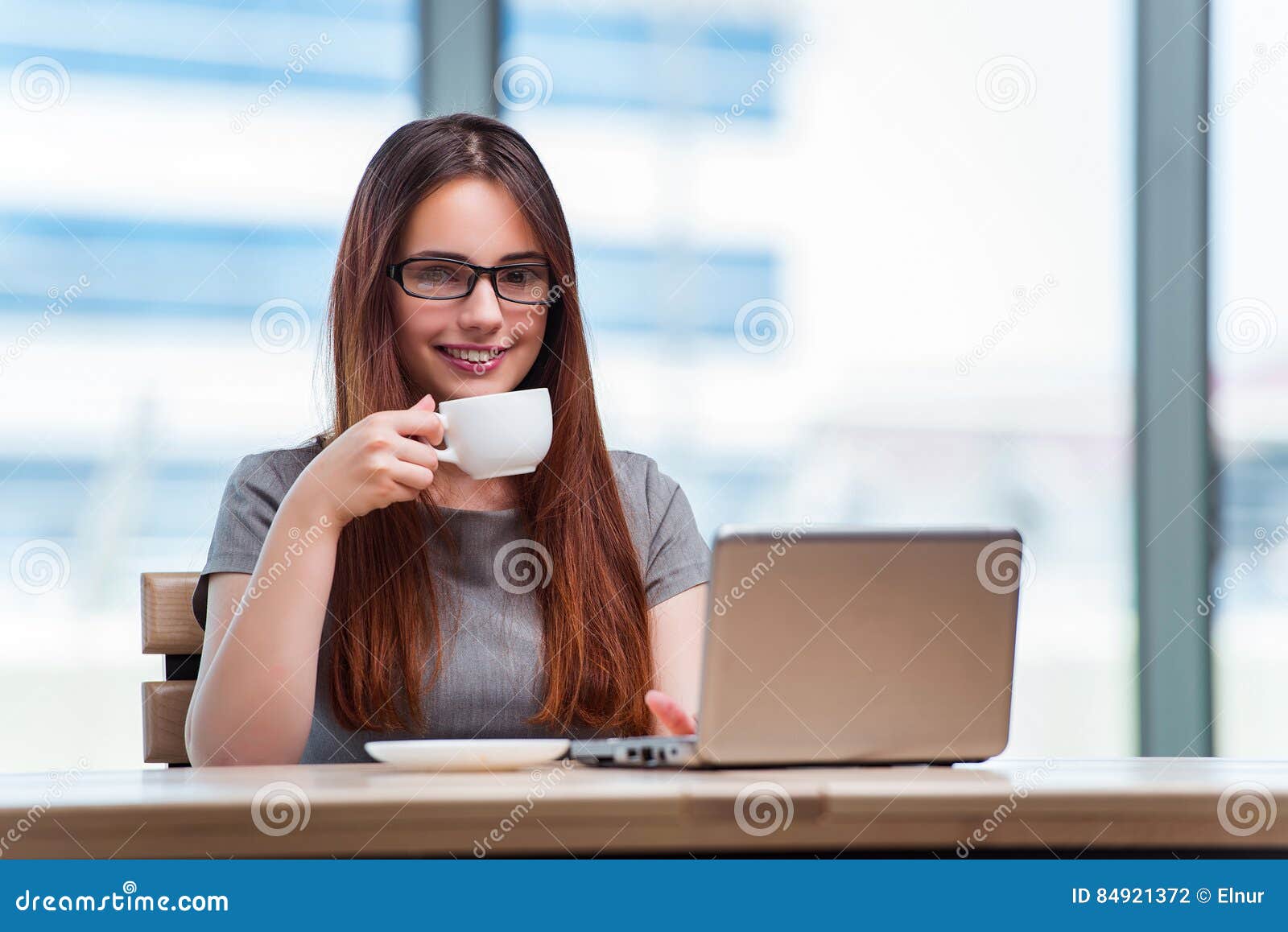 The Young Businesswoman Drinking Tea in Office Stock Photo - Image of ...