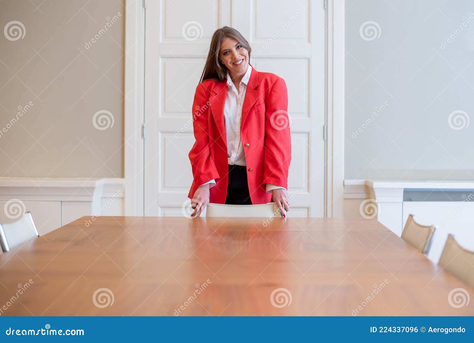 Young Businesswoman Leaning on Table Stock Photo - Image of attractive ...