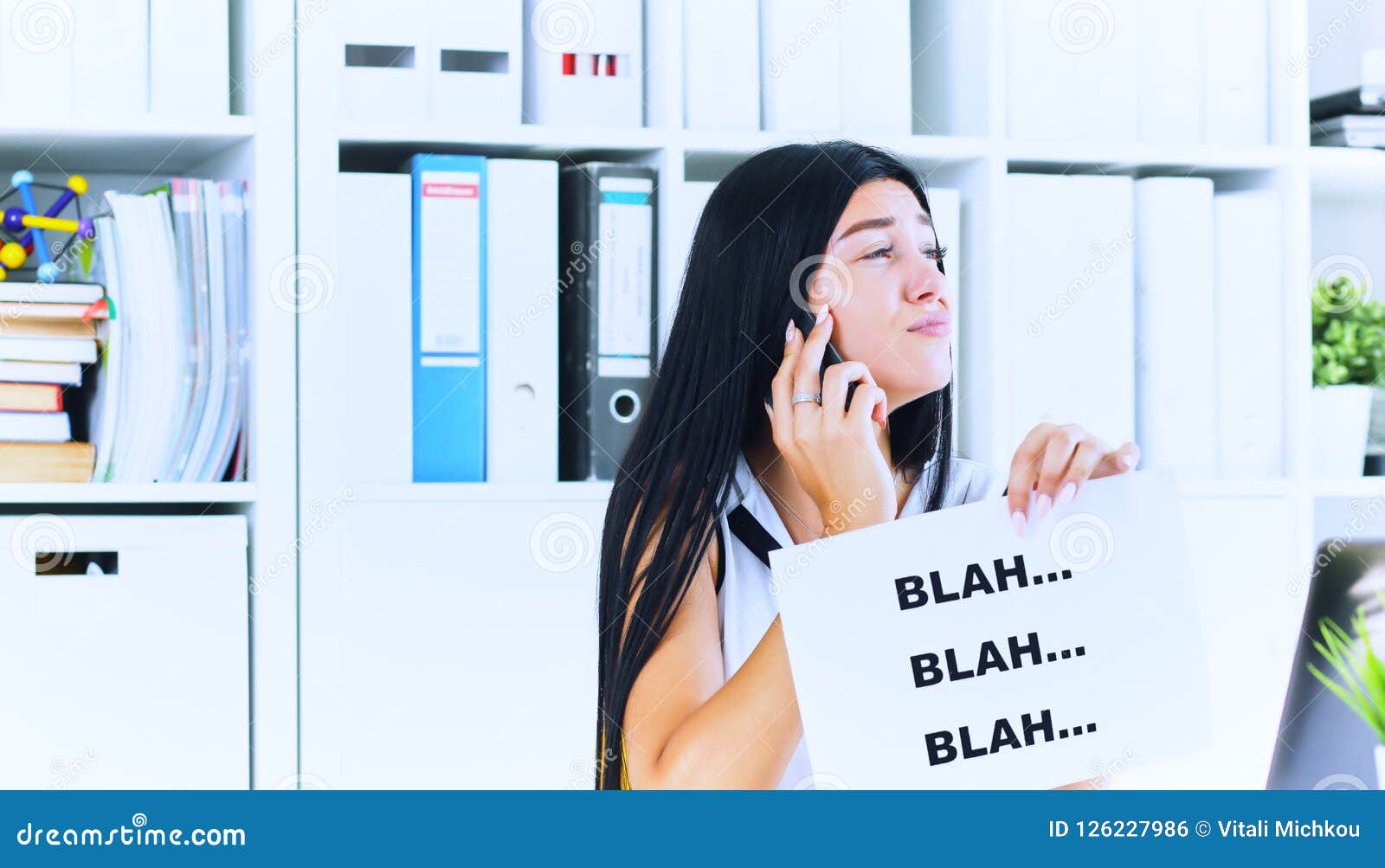 Young Businesswoman in the Process of Useless Conversation with the ...