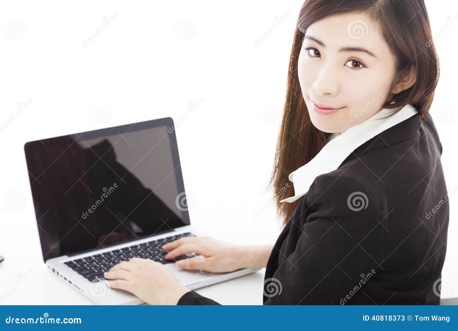 Young Businesswoman Sitting and Using a Laptop Stock Image - Image of ...