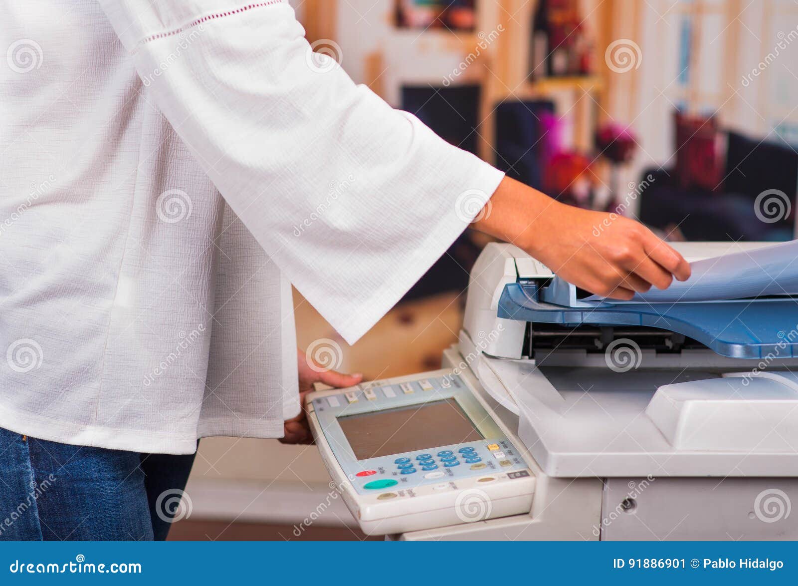 Young Businesswoman Using Copy Machine at the Office Stock Image ...