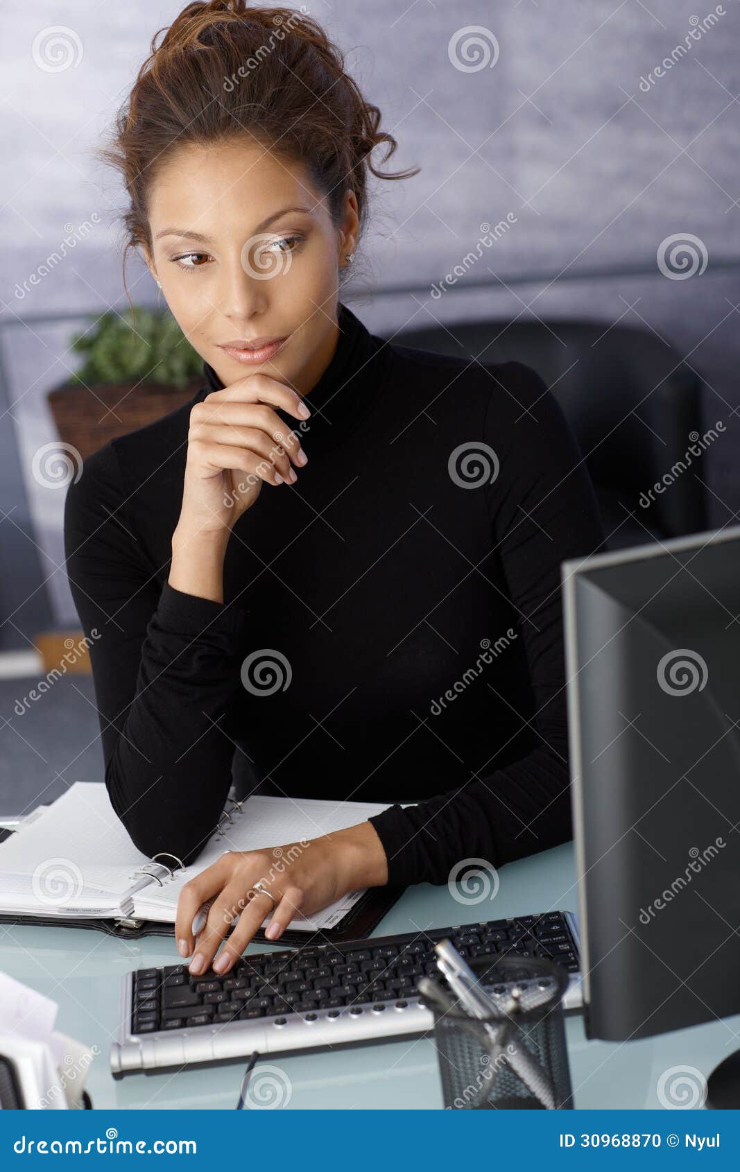 Young Businesswoman Working on Computer Stock Photo - Image of ...