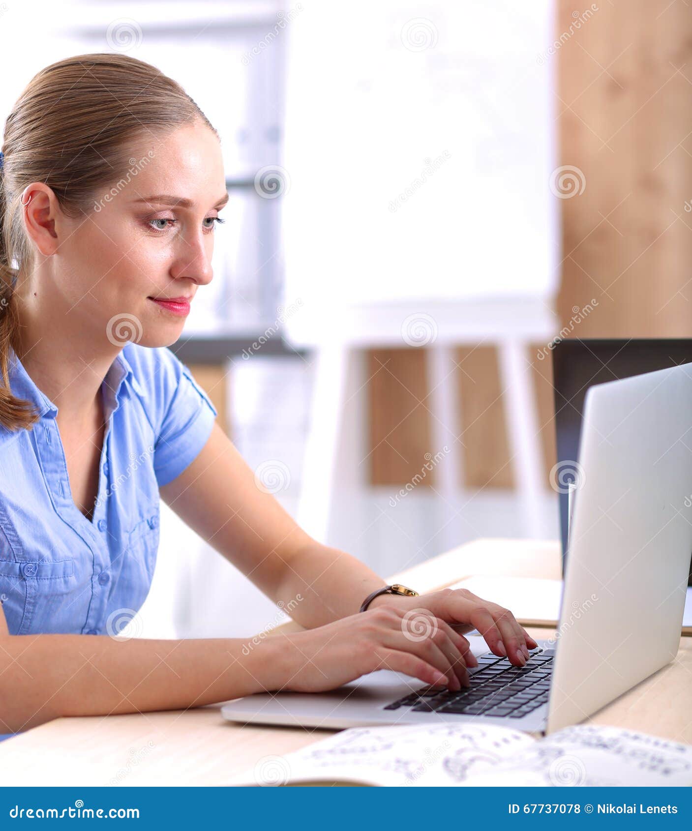 Young Businesswoman Working on a Laptop Stock Photo - Image of laptop ...