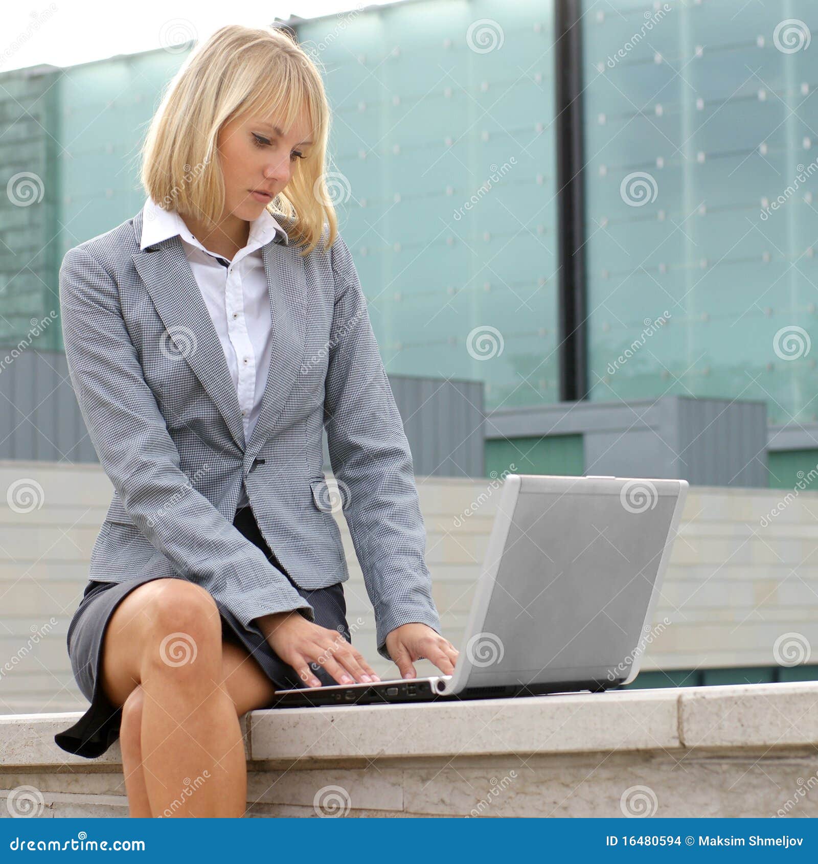 A Young Businesswoman is Working Outdoors Stock Photo - Image of ...