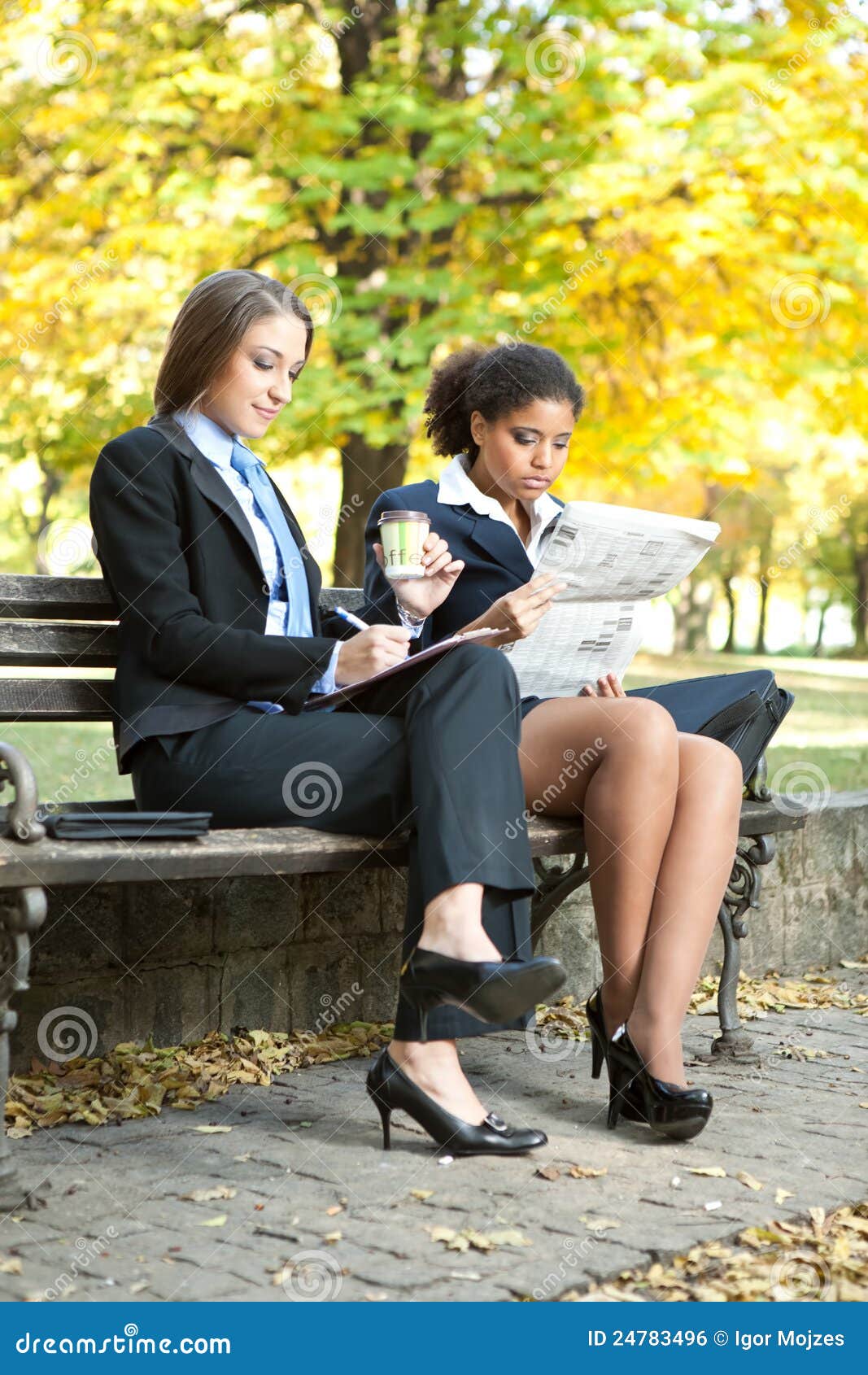Young Businesswomen on Break Stock Photo - Image of person, note: 24783496