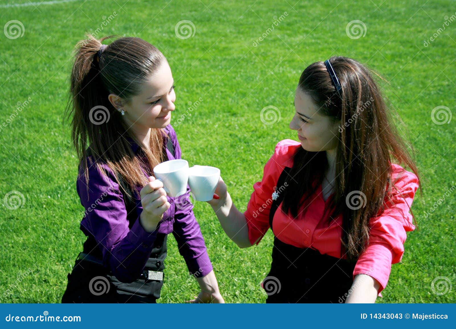 Young Businesswomen Drinking Tea and Talking Stock Image - Image of ...