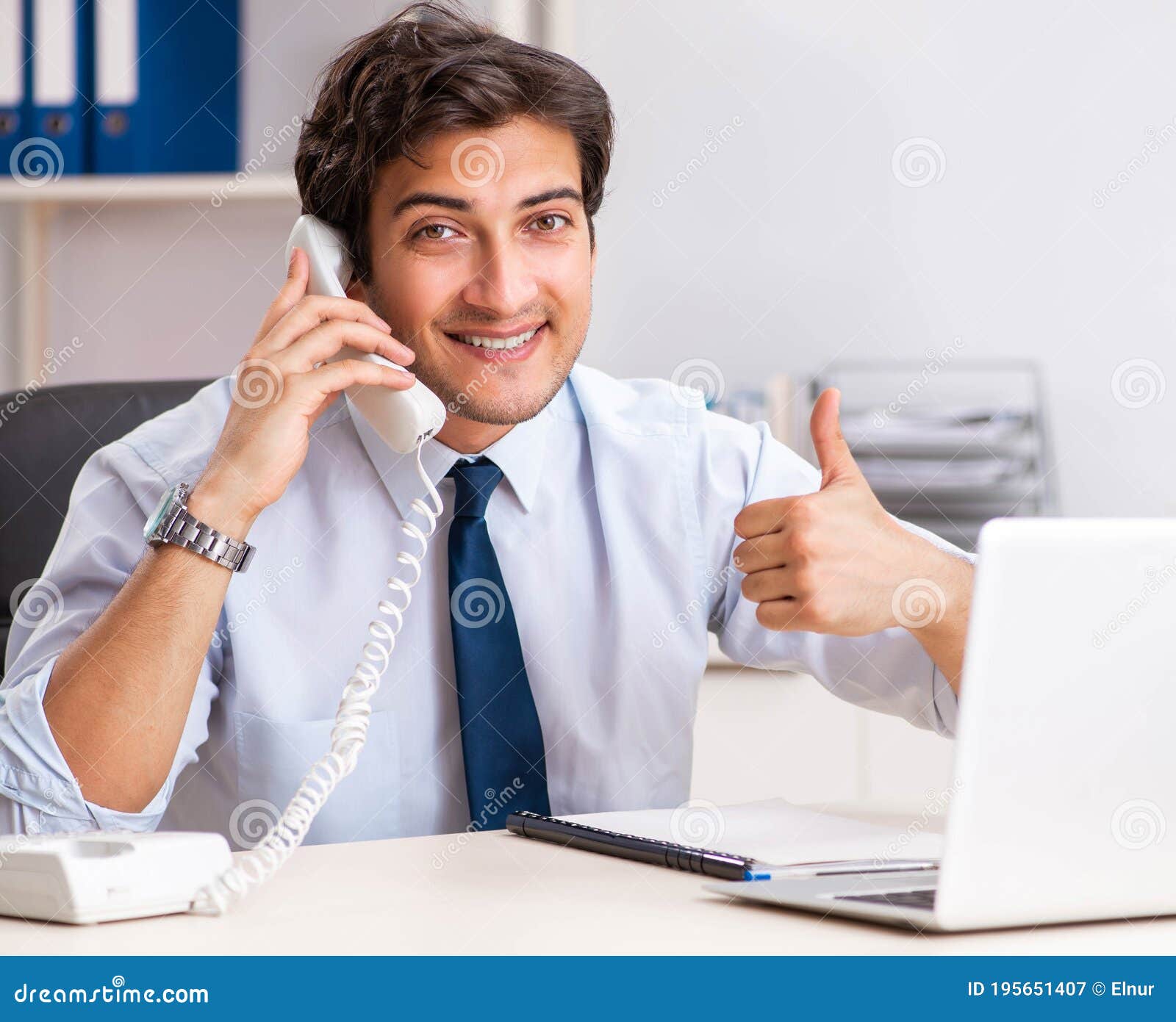 Young Call Center Operator Speaking on Phone Stock Image - Image of ...