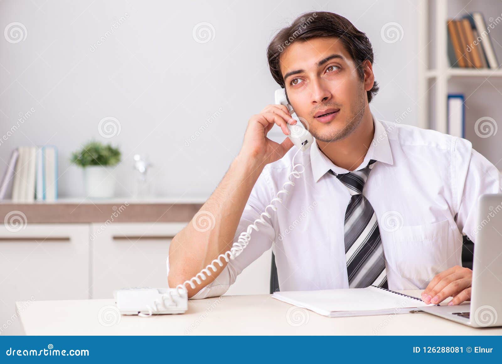 The Young Call Center Operator Speaking on Phone Stock Image - Image of ...