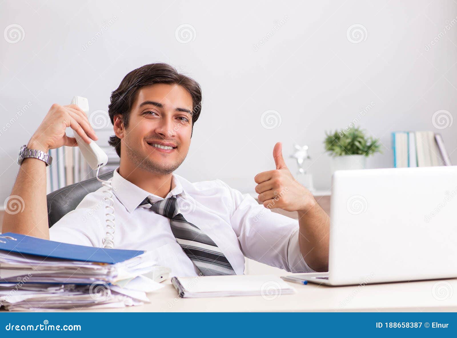 Young Call Center Operator Speaking on Phone Stock Image - Image of ...