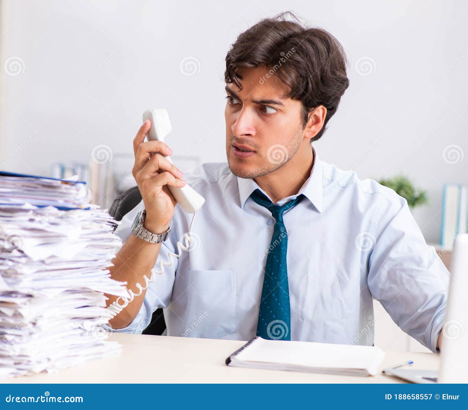 Young Call Center Operator Speaking on Phone Stock Image - Image of ...