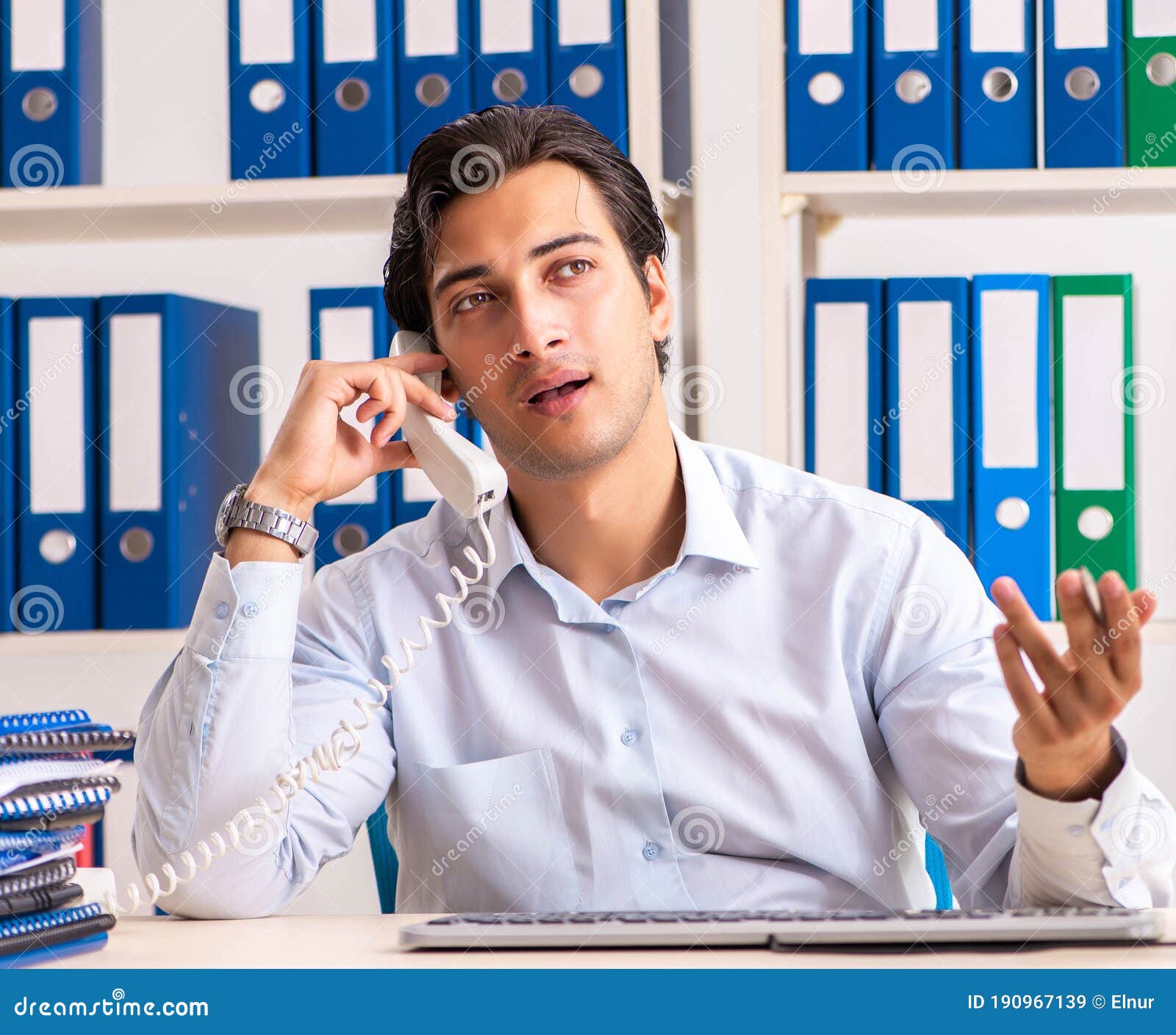 Young Call Center Operator Speaking on Phone Stock Image - Image of ...