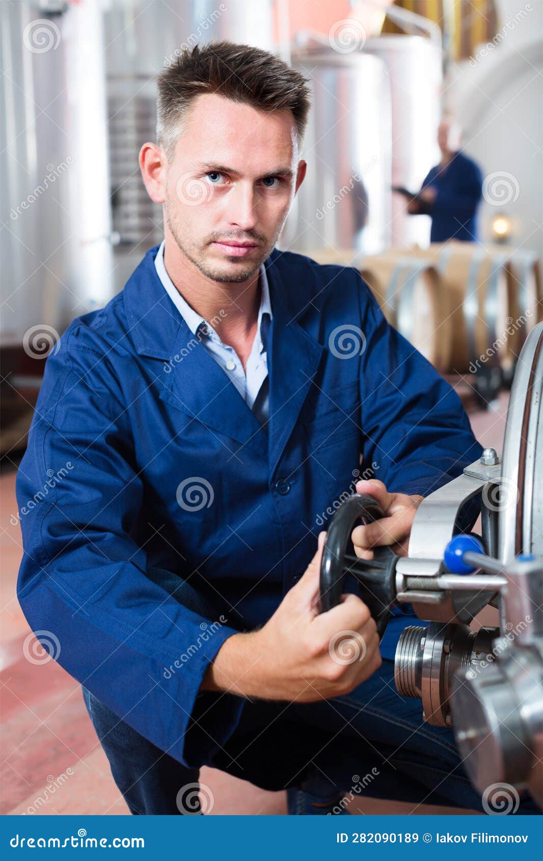 Young Calm Man Machinery Operator Working in Winery Stock Image - Image ...