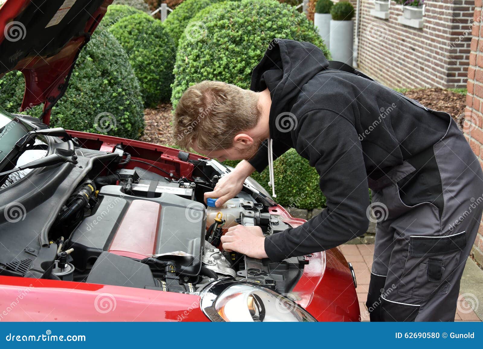 Young car mechanic at work stock photo. Image of mechanical - 62690580