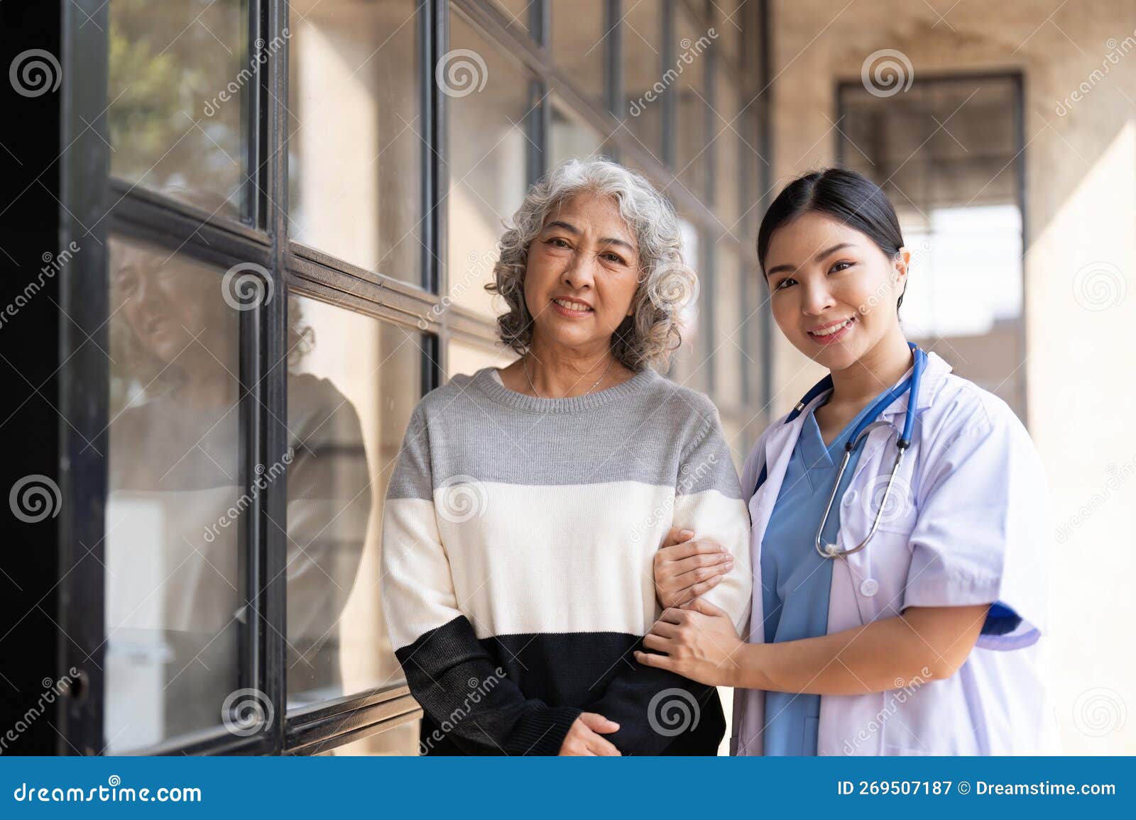 Young Caregiver Helping Senior Woman Walking Nurse Assisting Her Old
