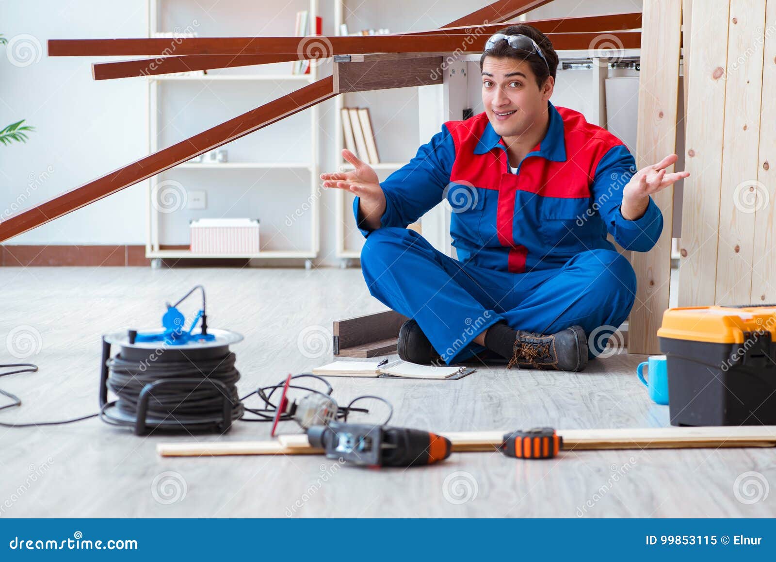 Young Carpenter with Notebook Writing Planning at Construction R Stock ...