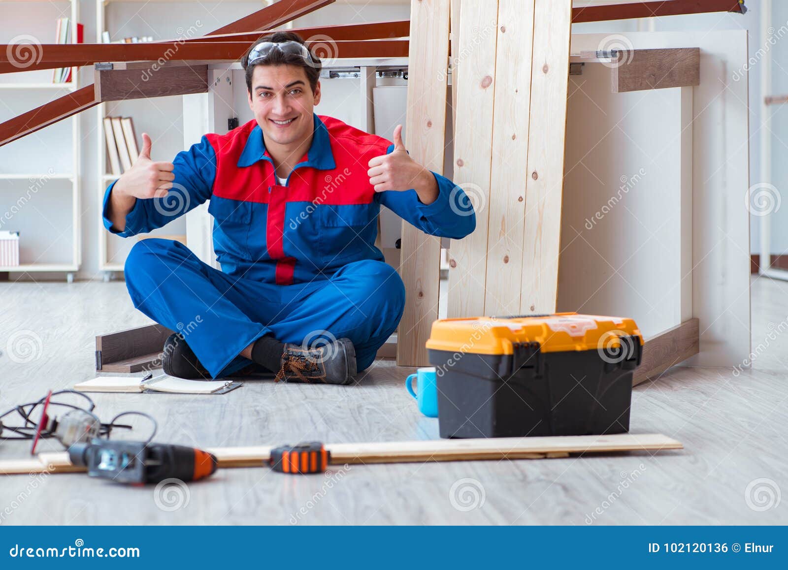 Young Carpenter with Notebook Writing Planning at Construction R Stock ...