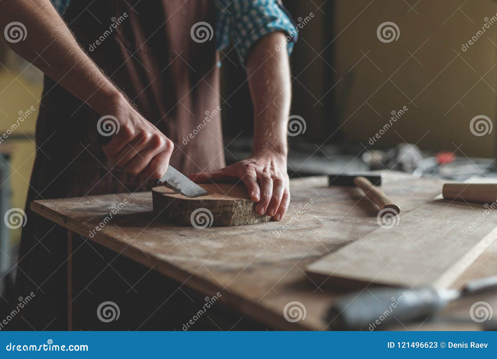 Young carpenter in uniform stock image. Image of worker - 121496623